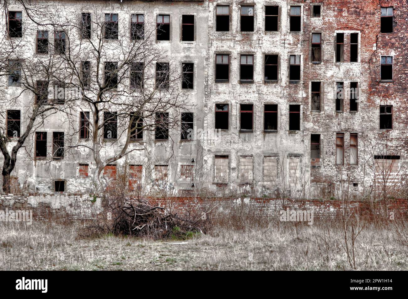 The dilapidated and ramshackle façade of a residential building ...