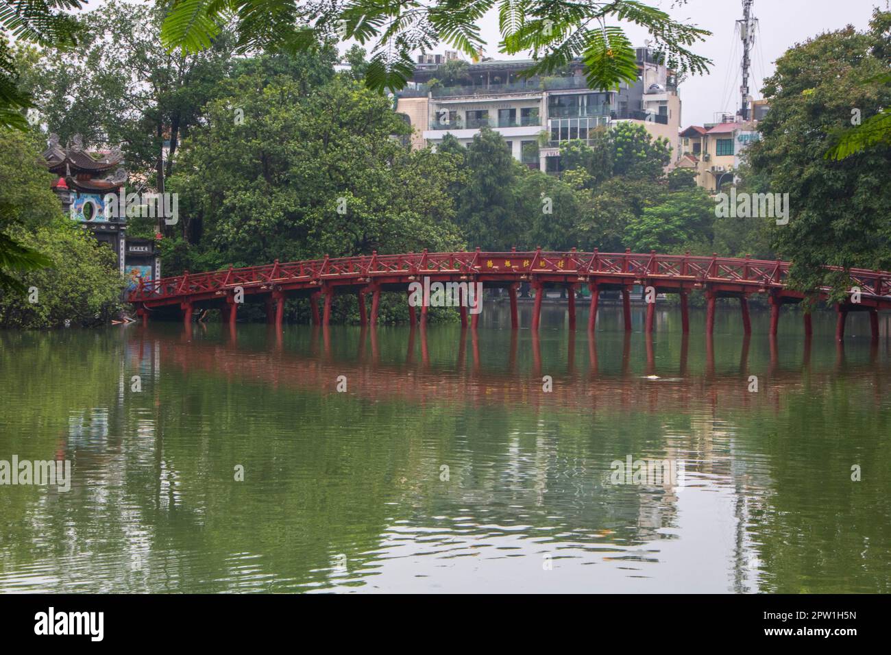 The Huc Bridge on Hoan Kiem lake at Hanoi also known as “Sword Lake ...