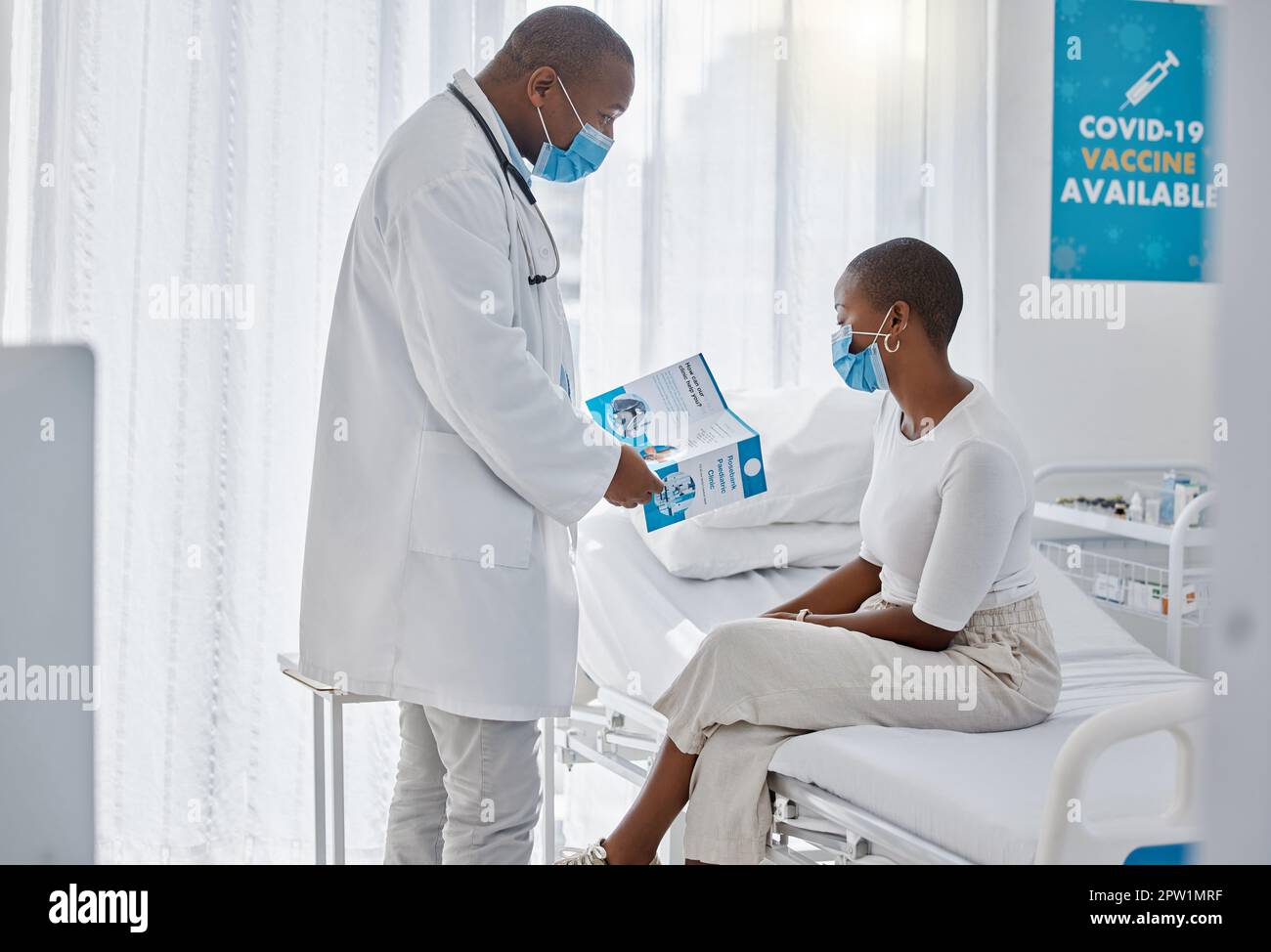 Doctor, brochure and medical patient consulting about covid while learning, gp about healthcare ...