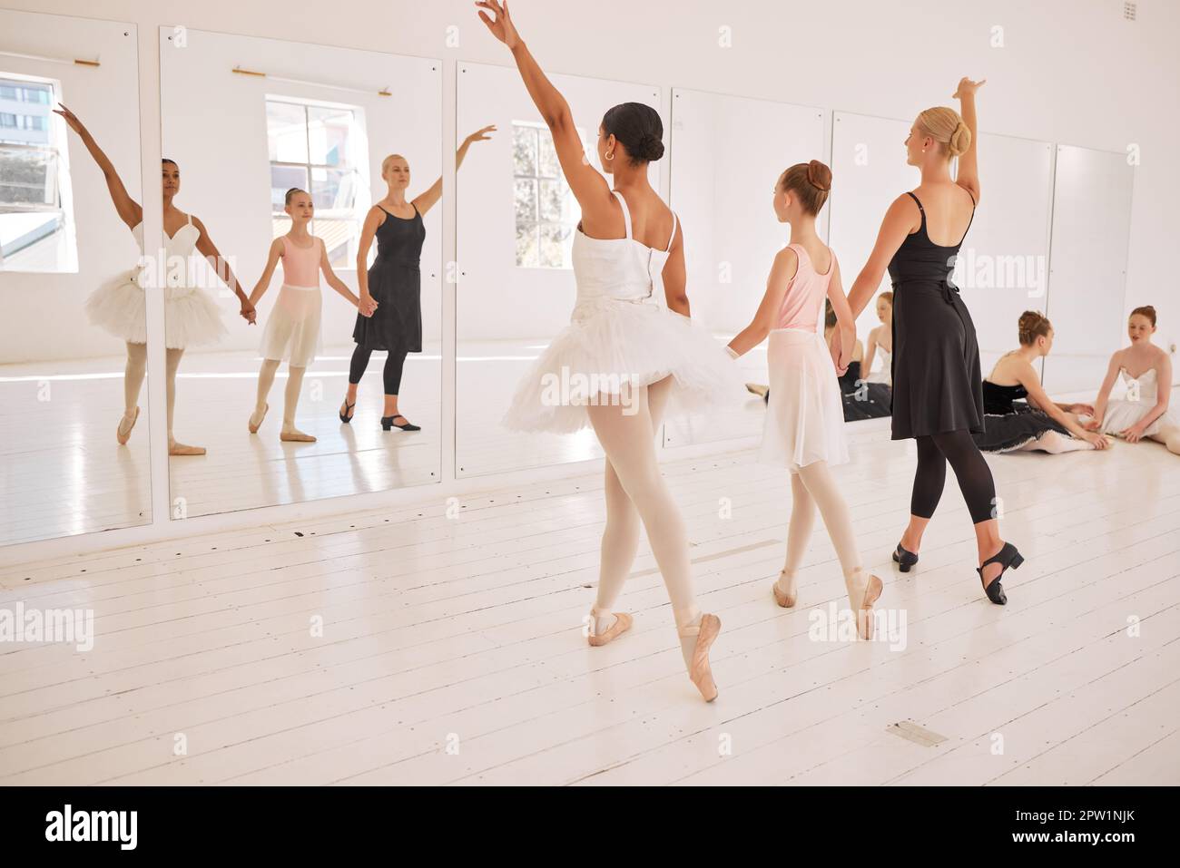 Ballet dancer doing dance performance in studio, team of women dancing ...