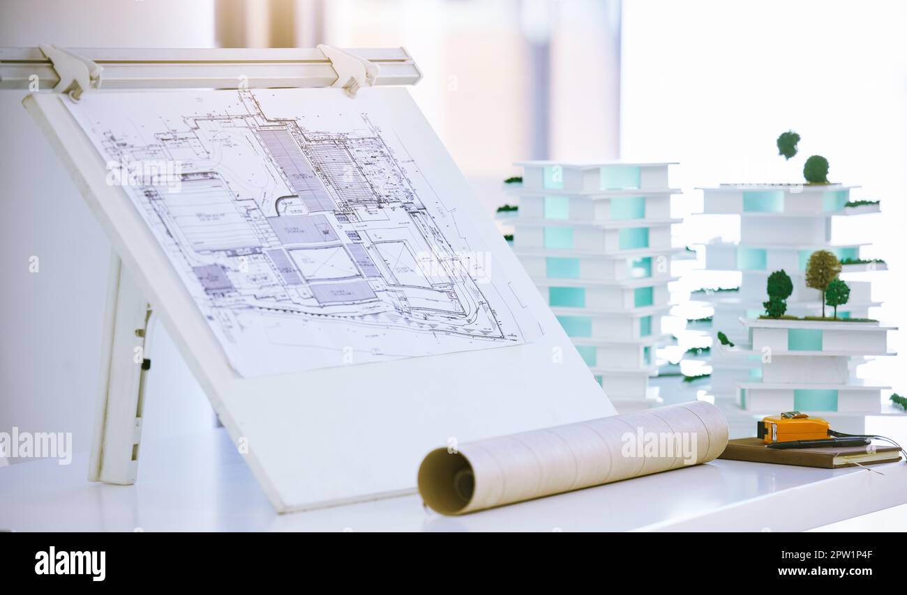 Blueprints, architecture and design of building model with plans for construction in ...