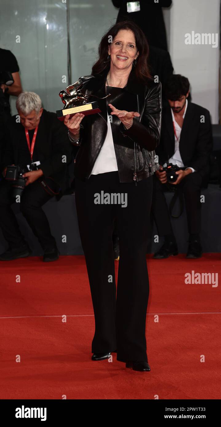 VENICE, ITALY - SEPTEMBER 10: Laura Poitras poses with the Golden Lion ...
