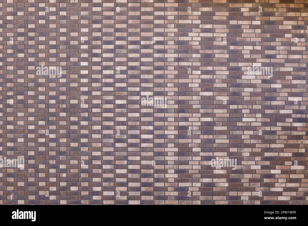 Dark brick wall pattern with chaotic masonry order. Background texture ...