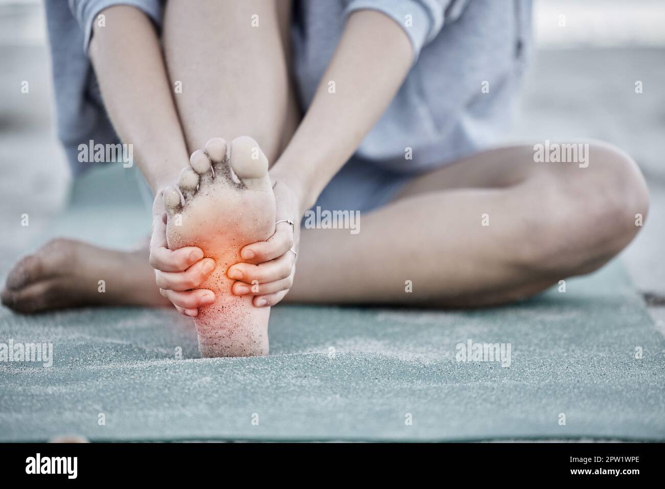 Foot, injury and pain with a woman holding her sole during fitness ...