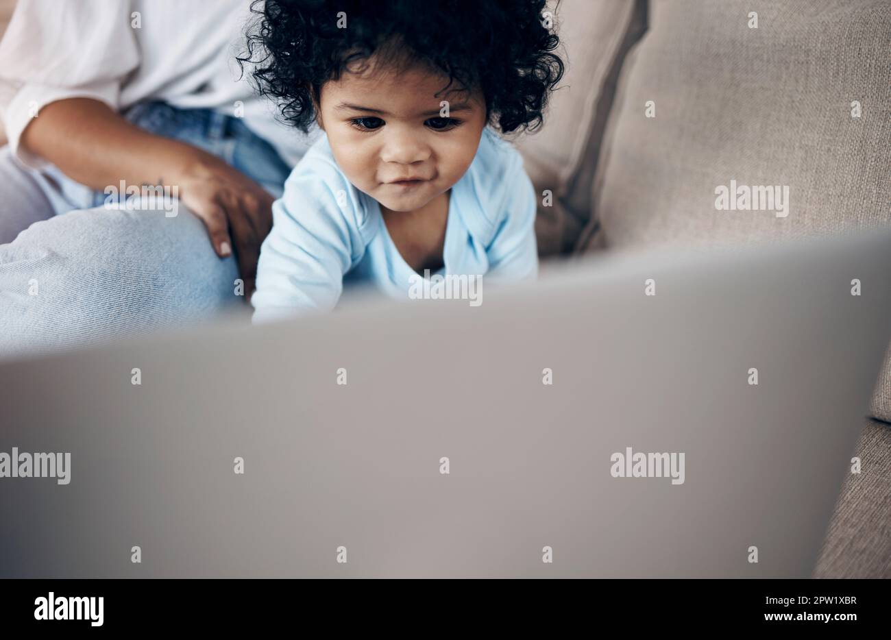 More screen-time please. an unrecognizable woman using a laptop with ...