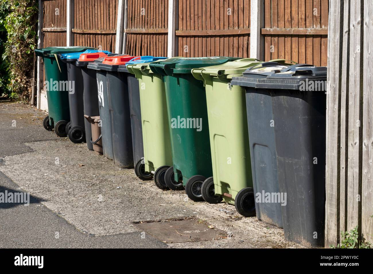 A line of different recycling bins Stock Photo - Alamy
