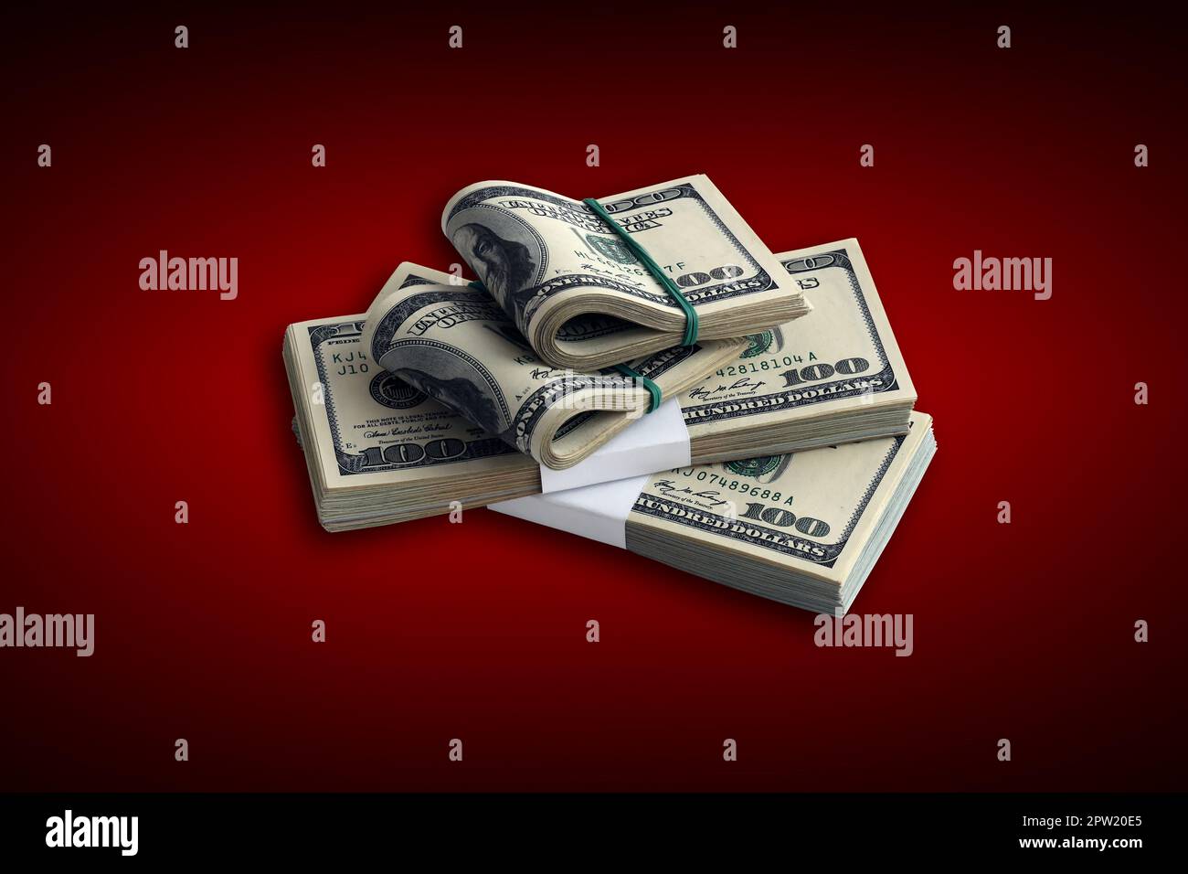 Bundle of US dollar bills on crimson red background. Pack of american ...