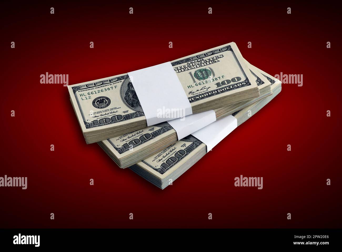 Bundle of US dollar bills on crimson red background. Pack of american ...