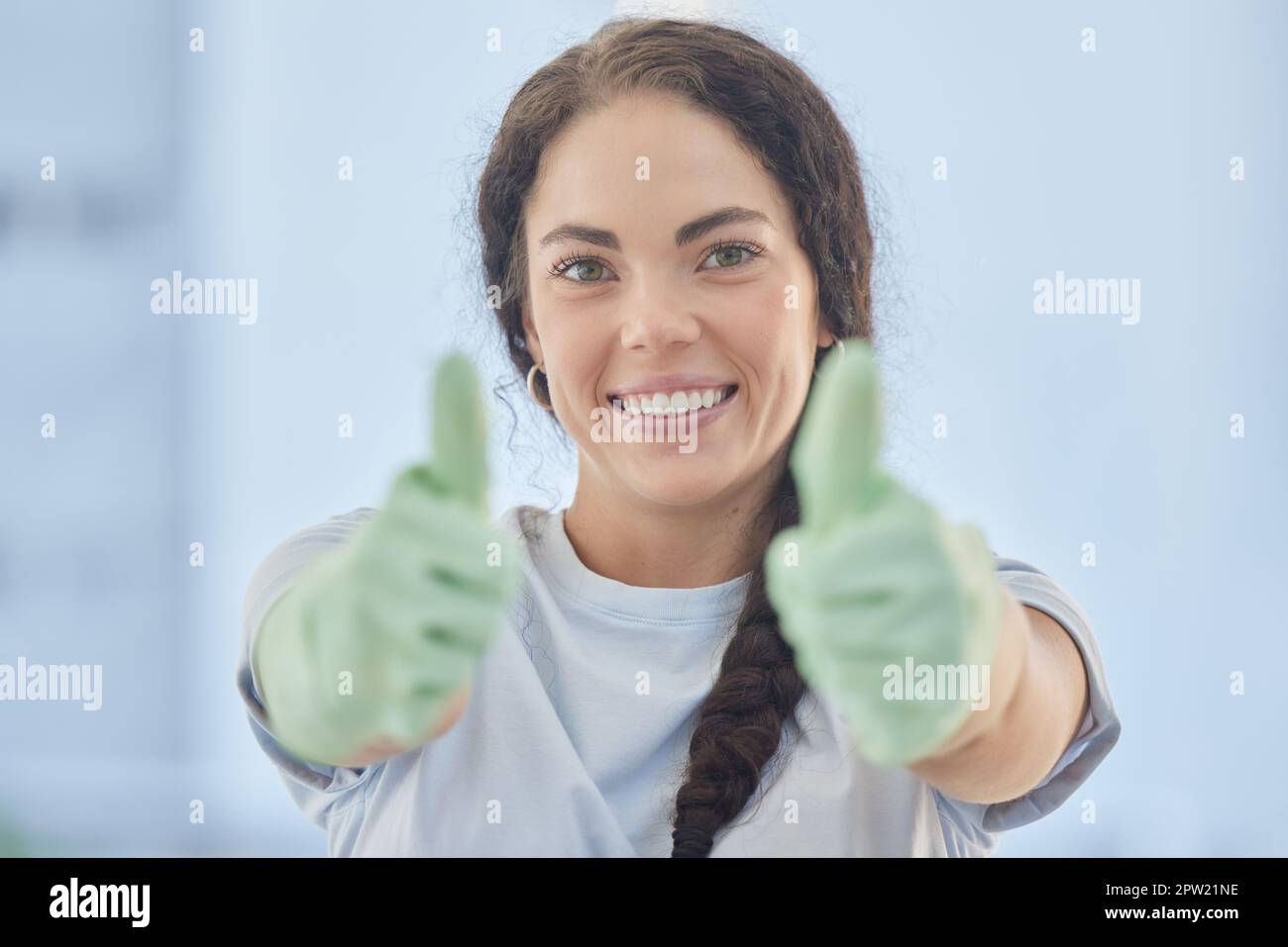 Thumbs up, woman and happy for success of cleaning service, motivation ...