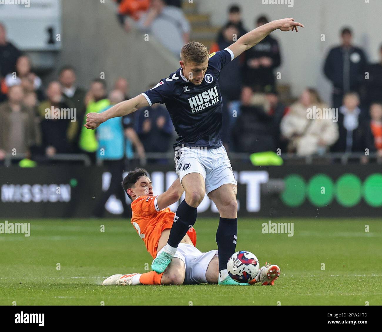 Charlie Patino #28 of Blackpool slides into Zian Flemming #10 of ...