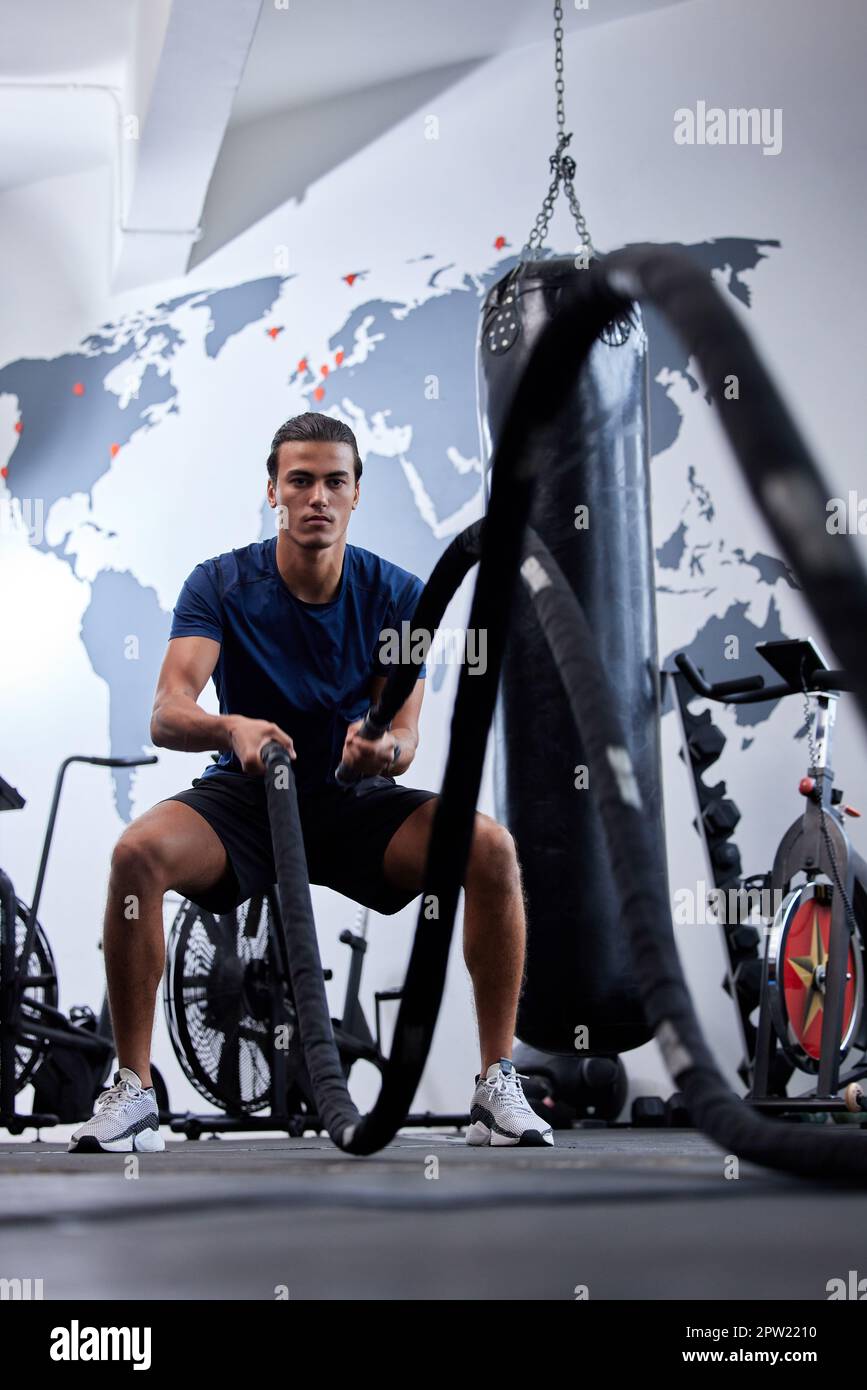 Fitness, man with rope and body builder, workout in gym with body ...