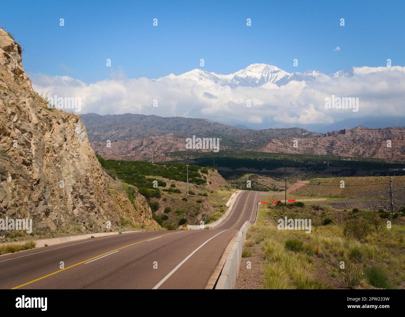 Scenic view of snow capped peak El Plata (6100 MSL) above the clouds ...