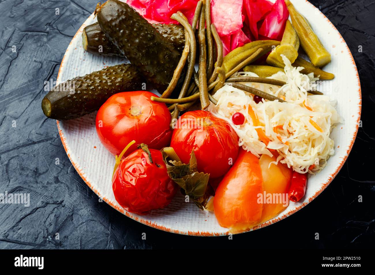 Assorted vegetable pickles, spicy pickled on a plate. Marinated ...
