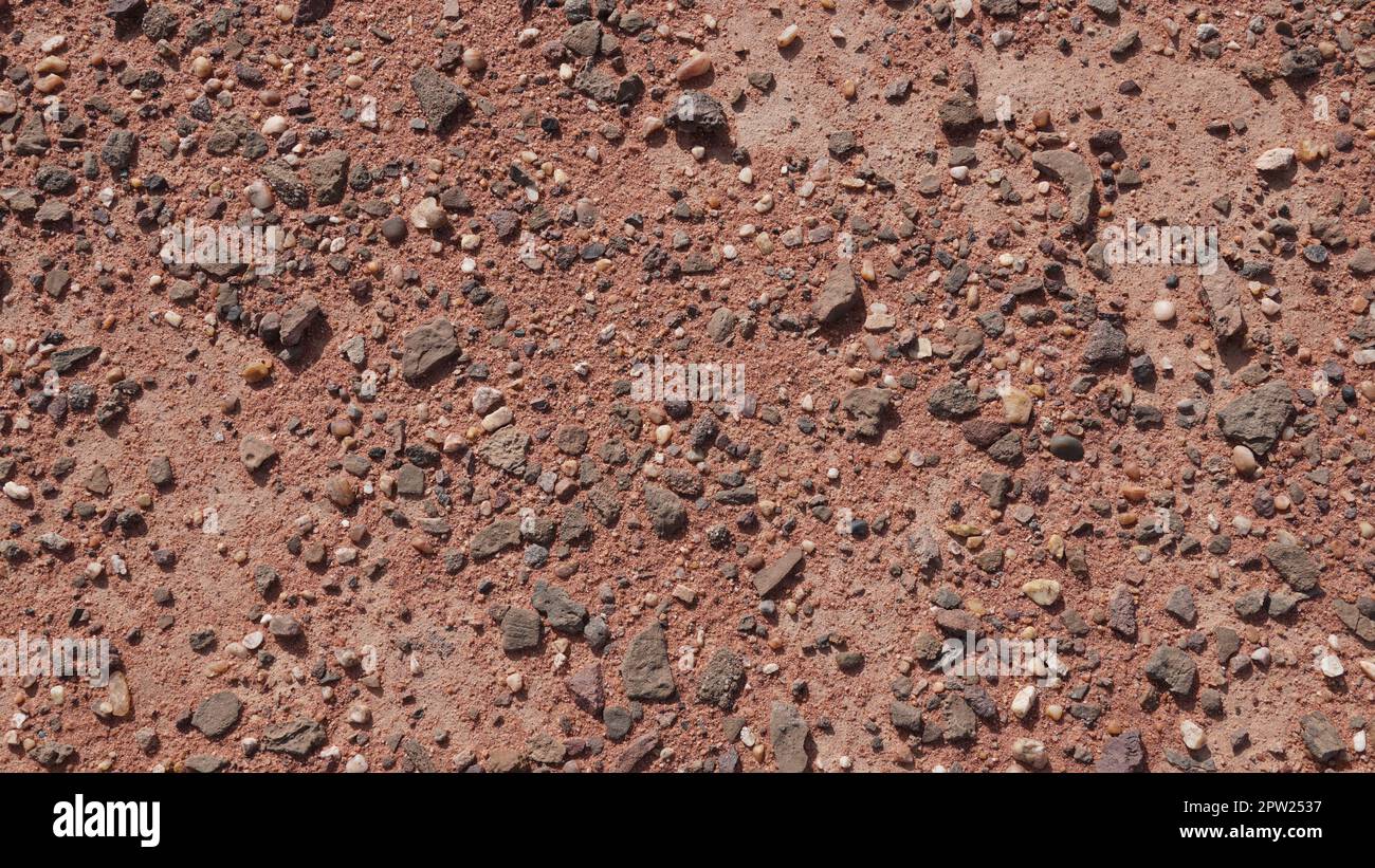 Red soil terrain after rain, in the national geological Timna park ...