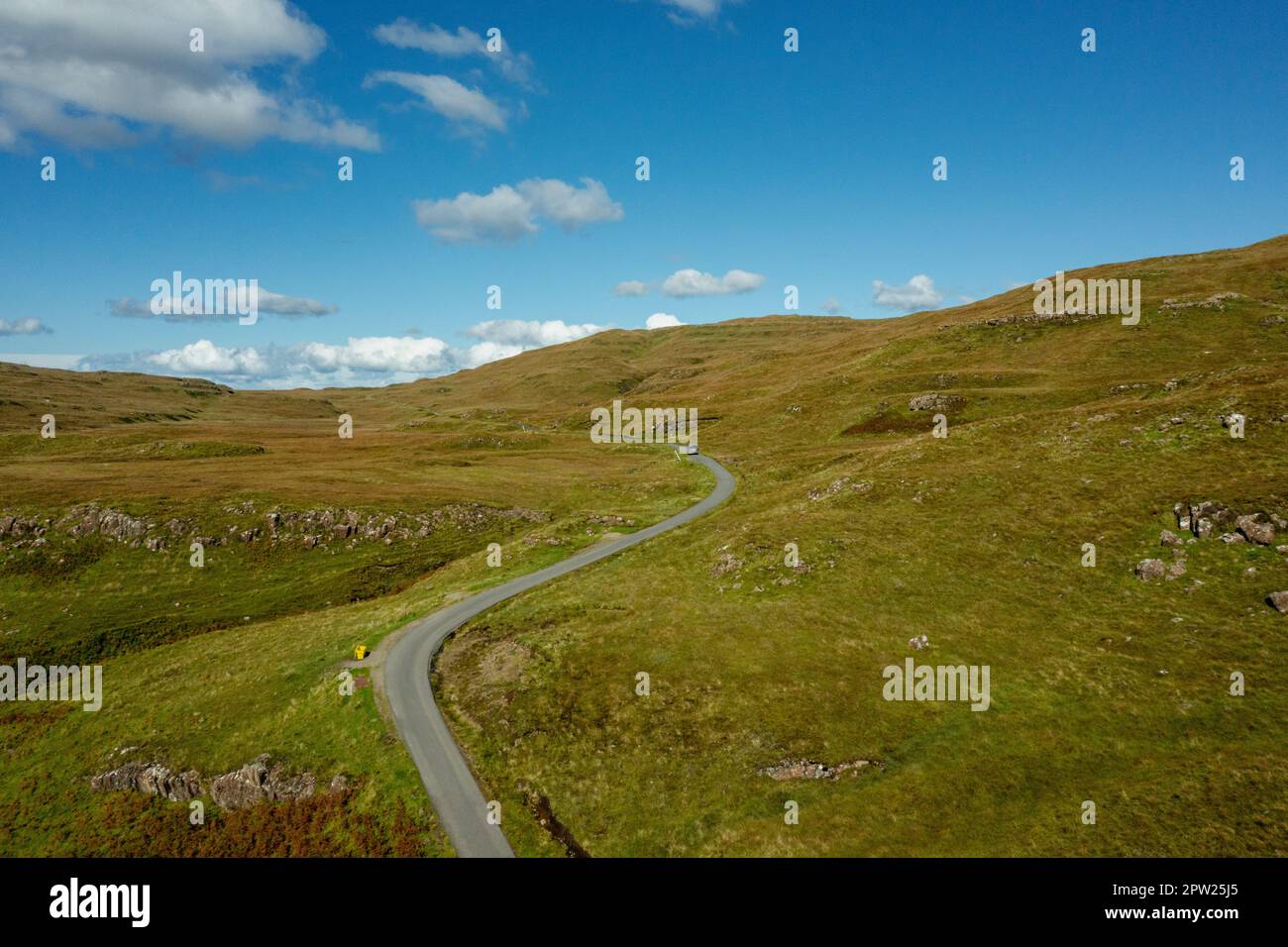 Aerial view of winding road in Scotland. Beautiful and clean nature ...