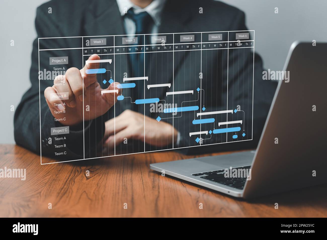 Project manager analyst working with computer in management system to ...
