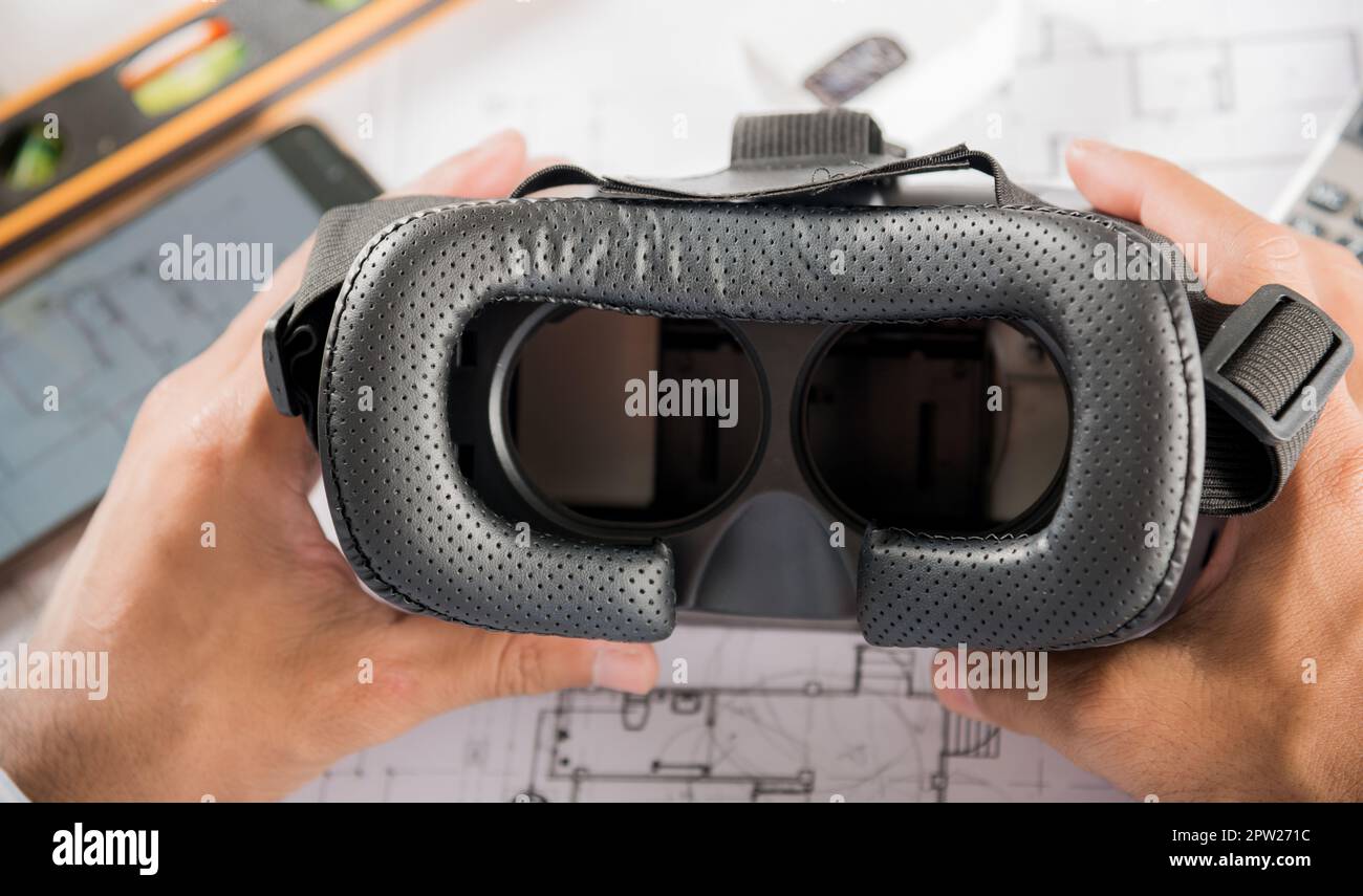 Architectural building design hold back 3D VR glasses and construction ...