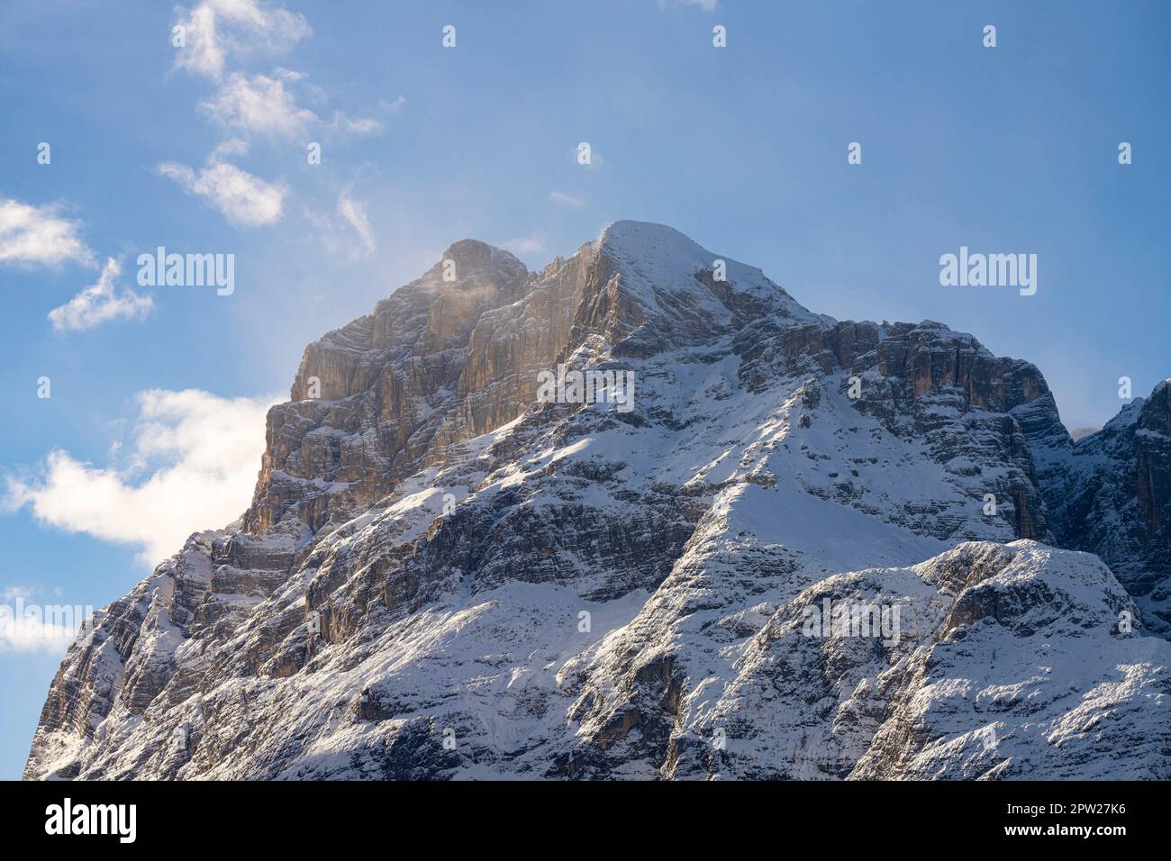 snow and ice deposited on the rock face of a mountain in winter Stock ...