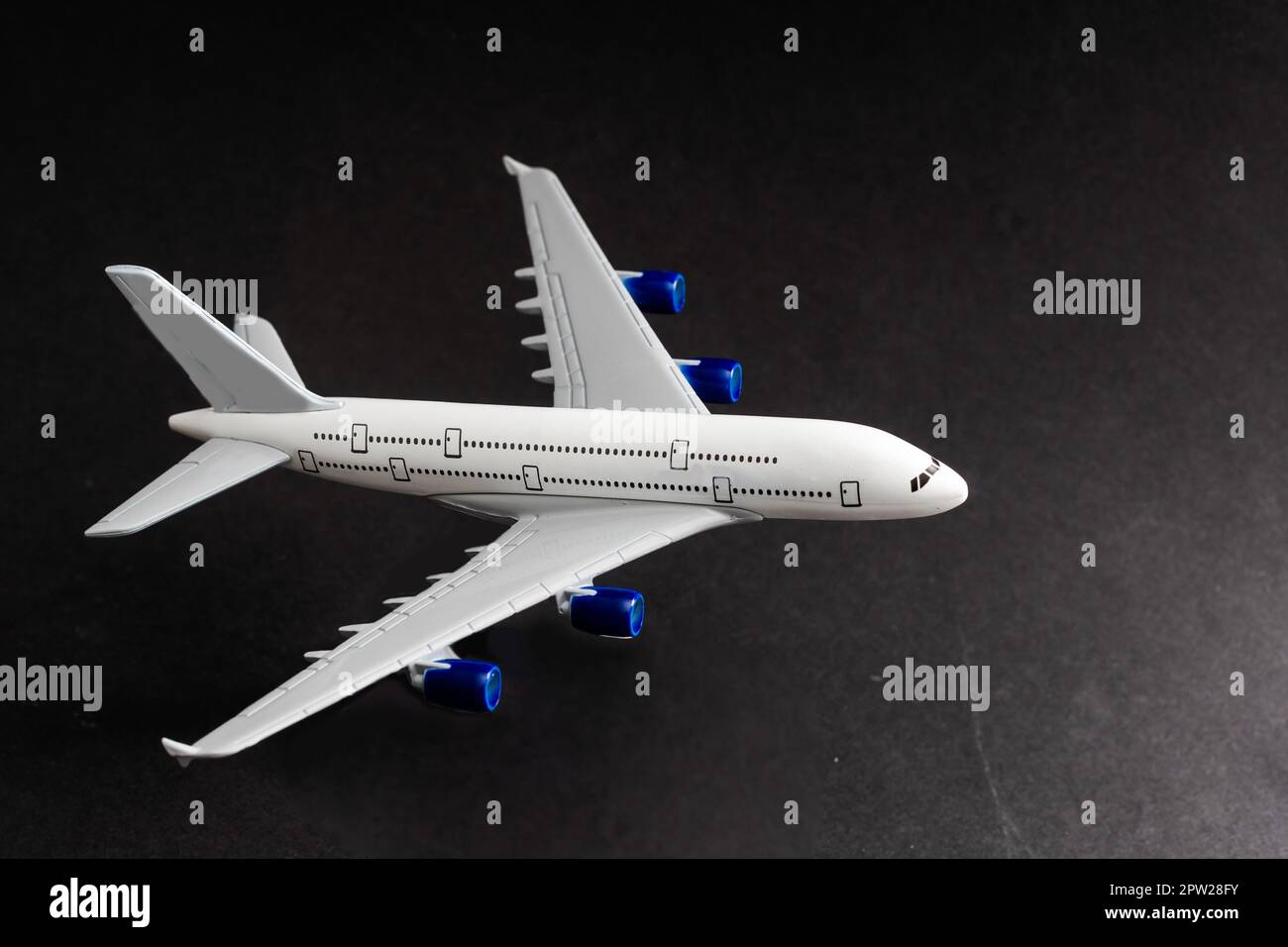 Model plane, airplane on dark background Stock Photo - Alamy