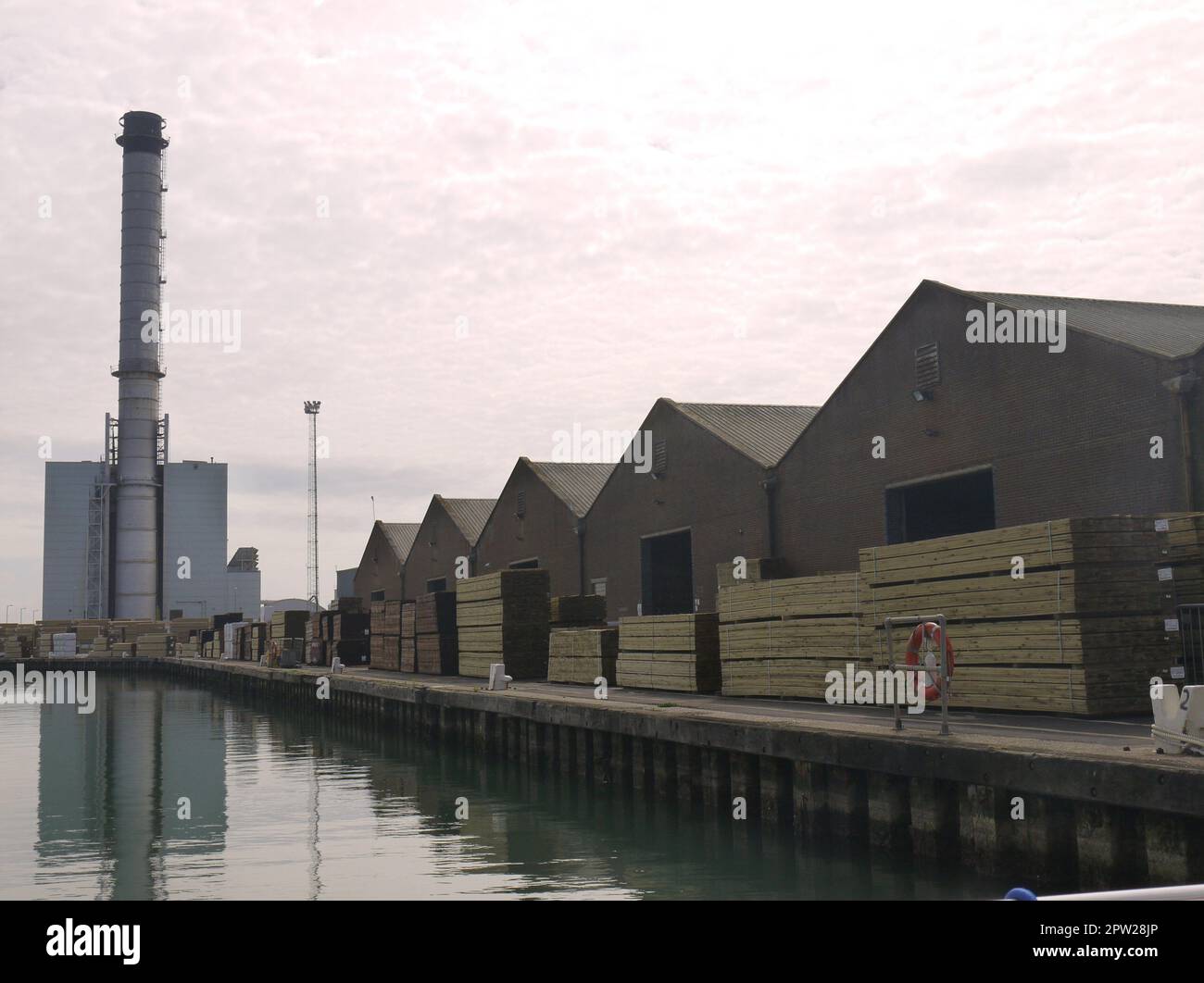 Stacks of imported timber near Shoreham Power Station, Shoreham Port ...