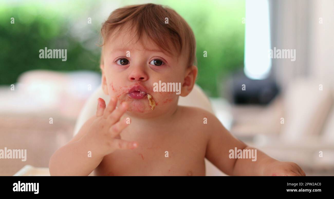 Infant toddler chewing food hi-res stock photography and images - Alamy