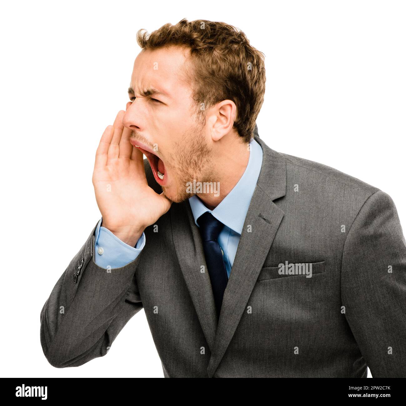 Hes been frustrated lately. a young businessman shouting against a ...
