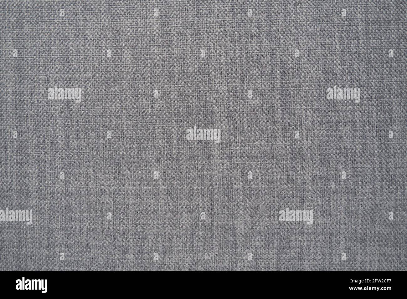gray background fabric texture. A piece of woolen cloth is neatly laid ...