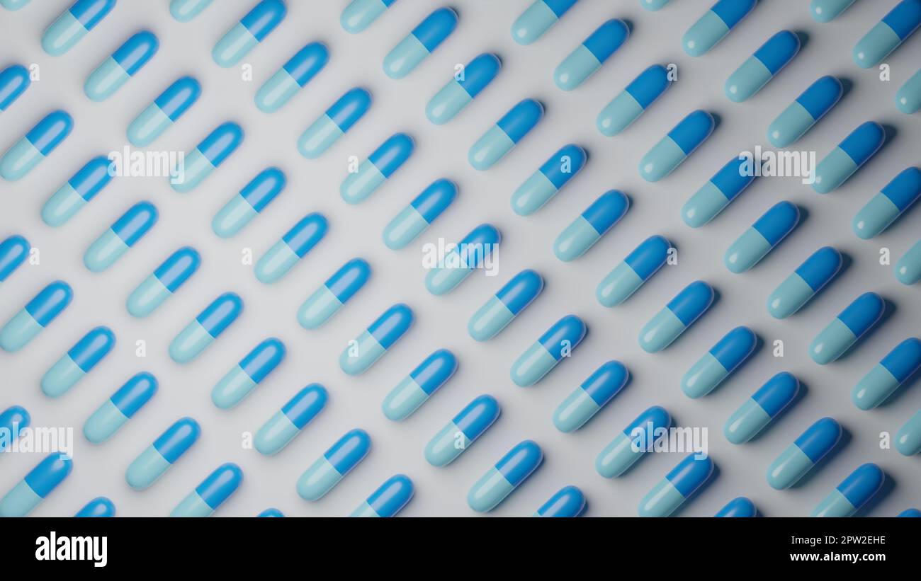 Light blue pills on white background. Pharmaceutical industry, medical ...