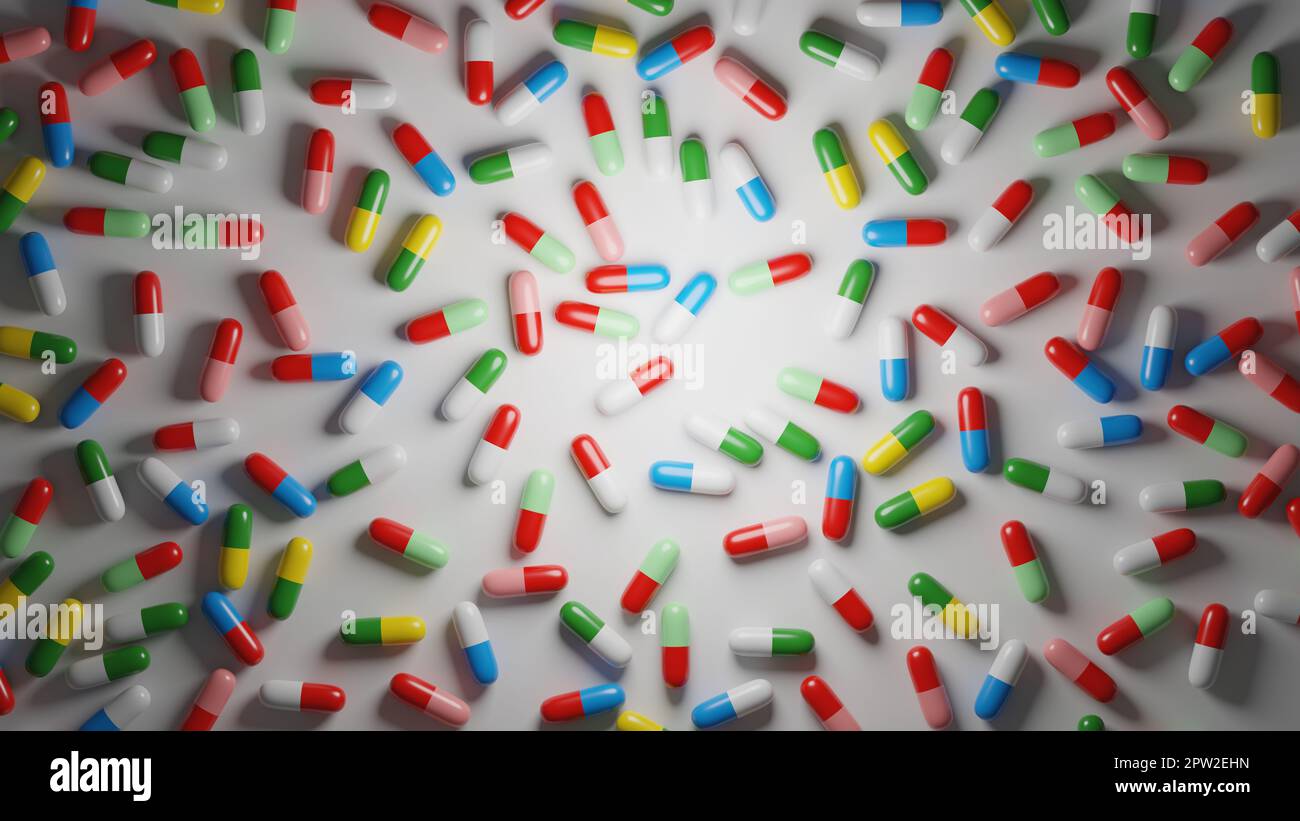 Multicolored pills on white background. Medical treatment ...