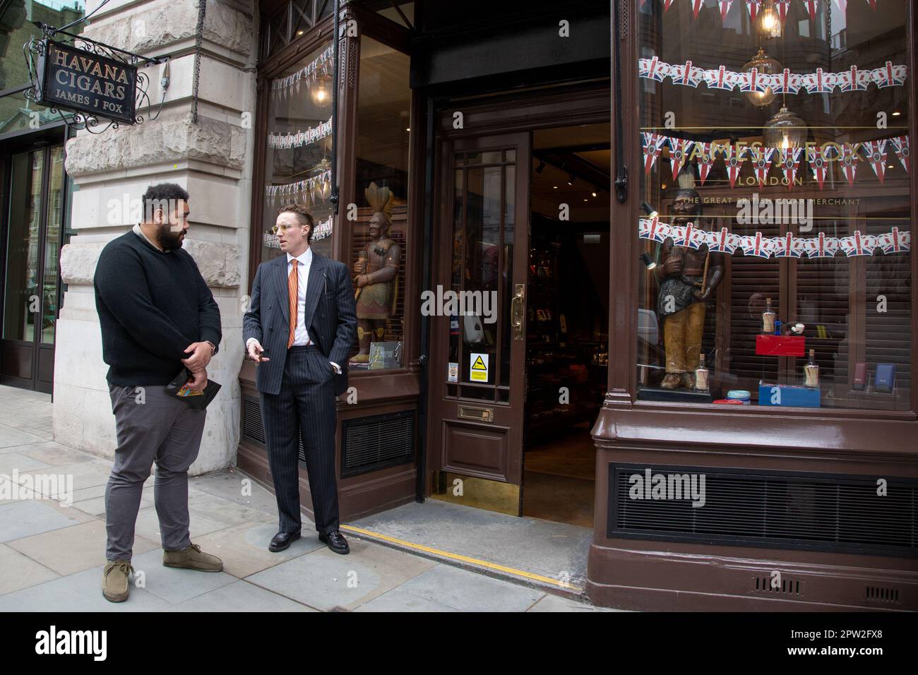 London, UK. 28th Apr 2023. Shop windows are decorated as London is ...