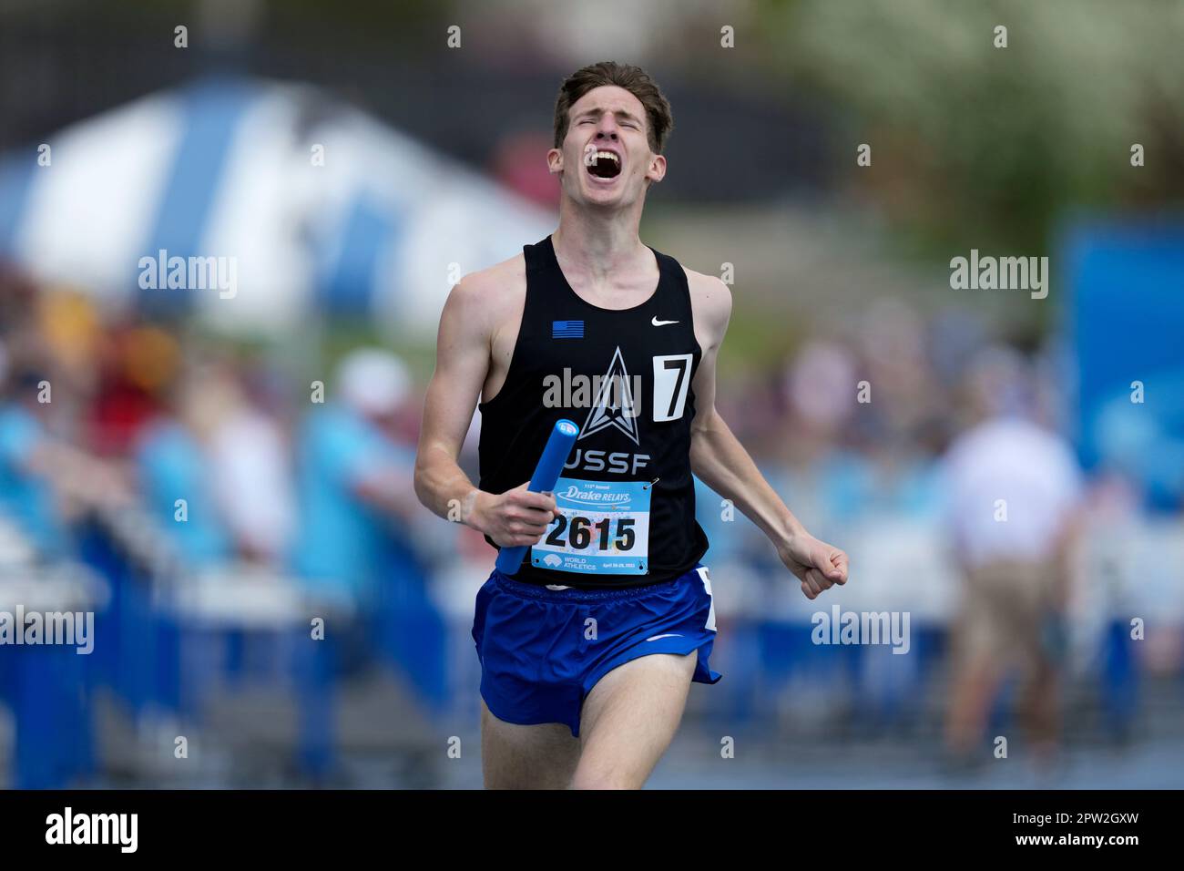 Air Force's Eli Bennett celebrates as he anchors his team to victory in ...