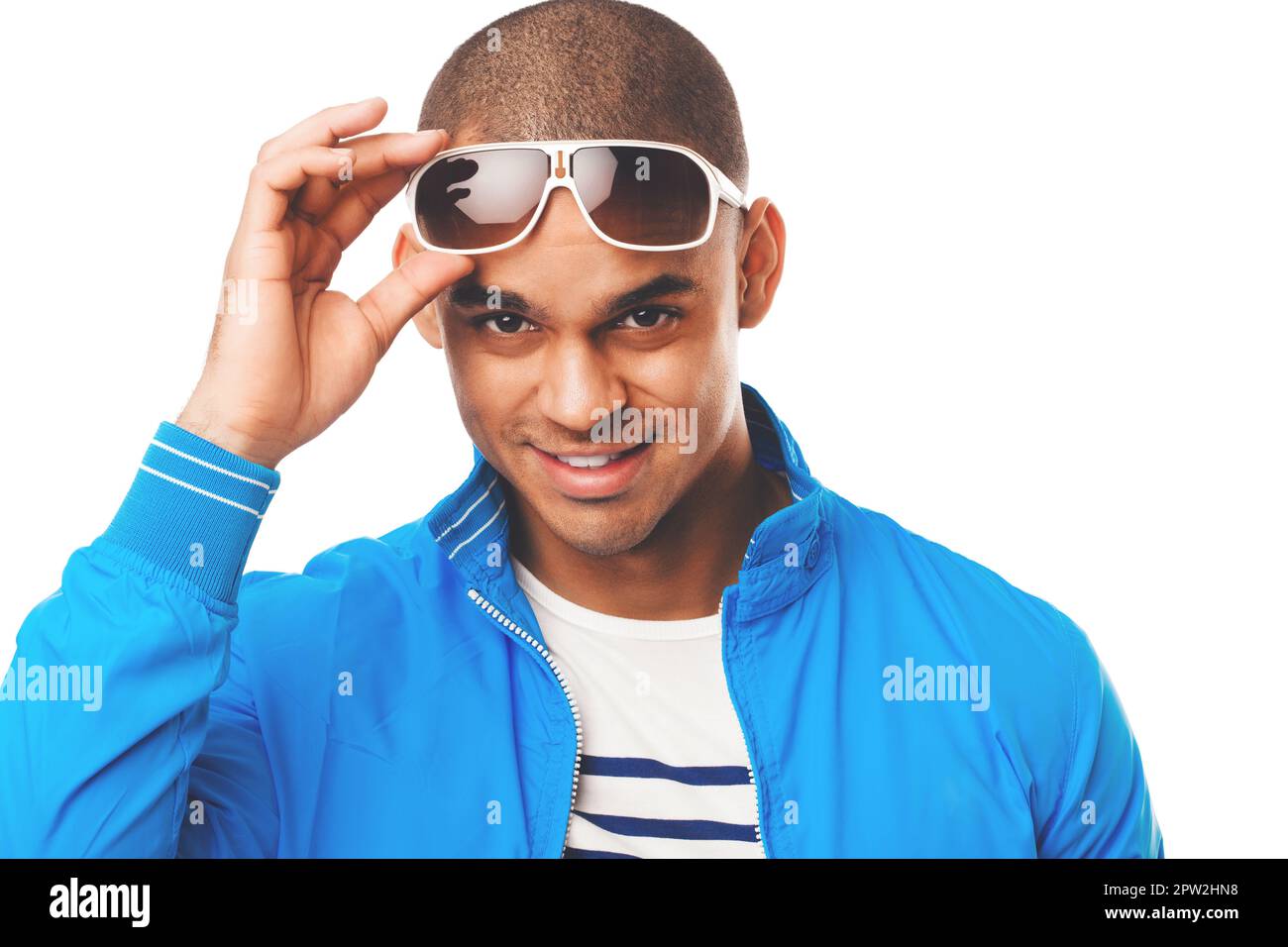 Man fashion model posing against a studio background Stock Photo - Alamy