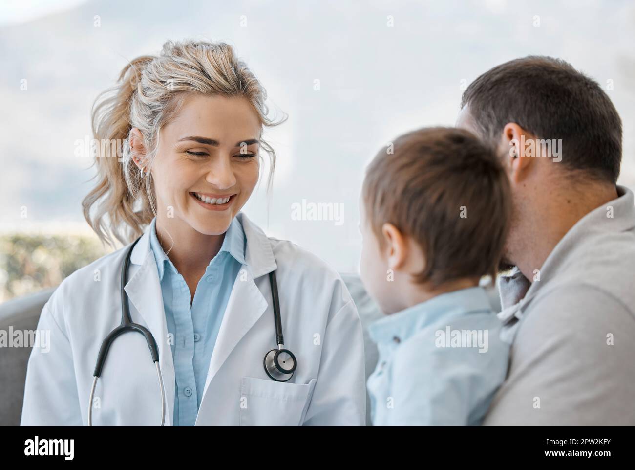 Smiling child doctor after a checkup. Happy caucasian healthcare ...