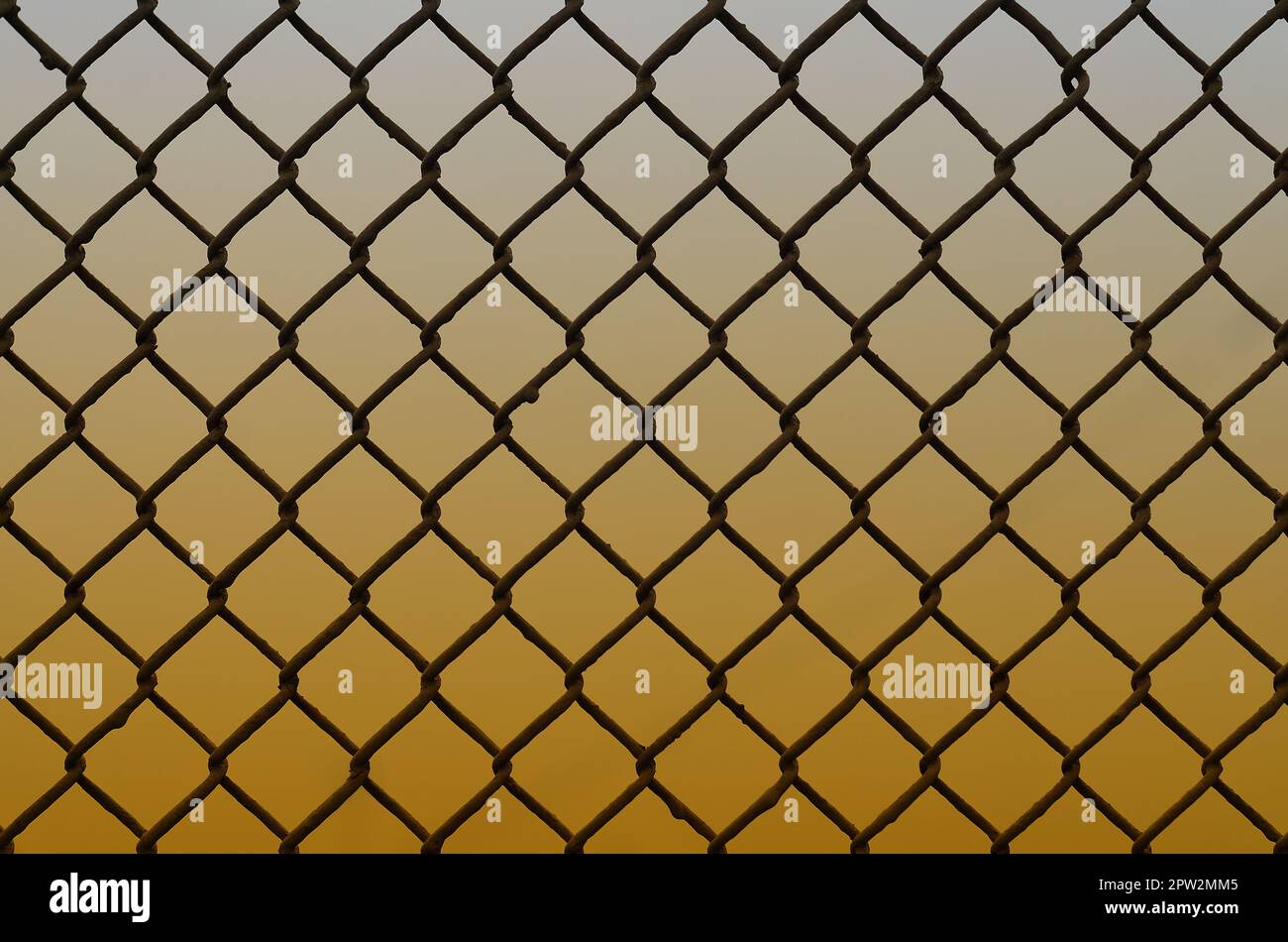 Texture of an old and rusty metal mesh on a neutral colored background ...