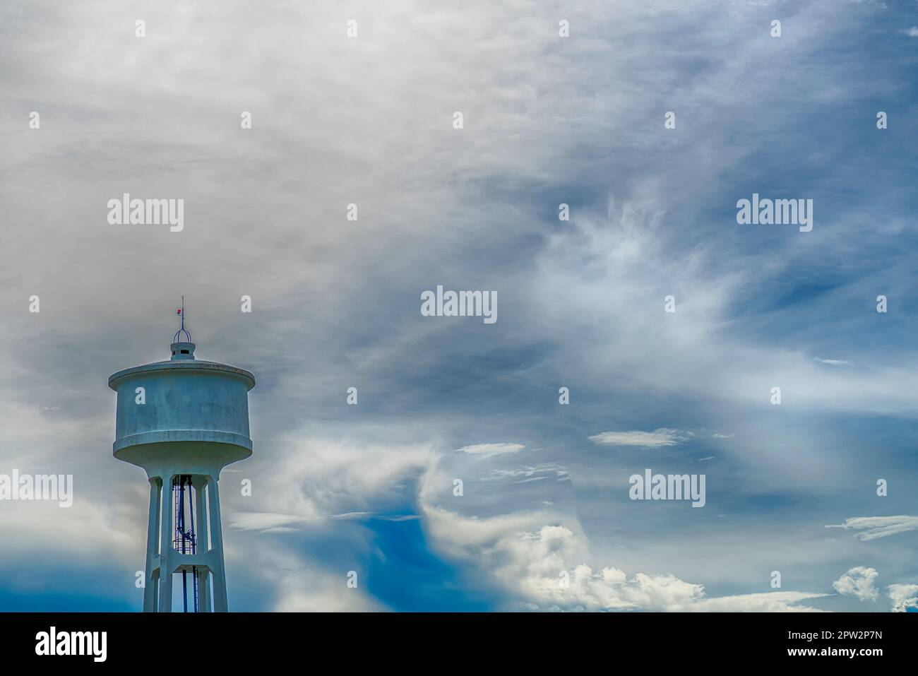 Water tank tower at evening on cloud background Stock Photo - Alamy