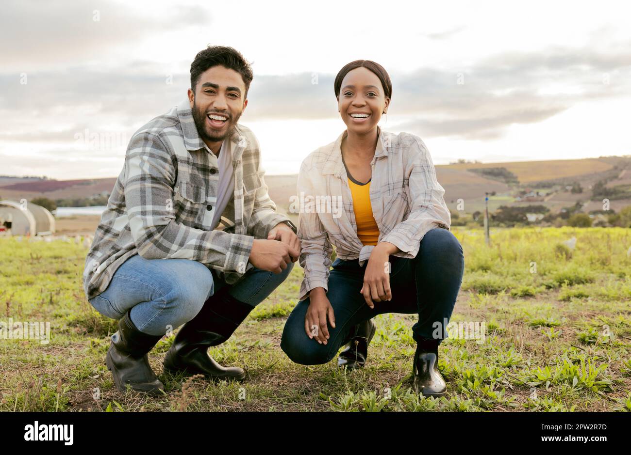 Farm, agriculture and portrait of happy couple on grass field kneeling ...