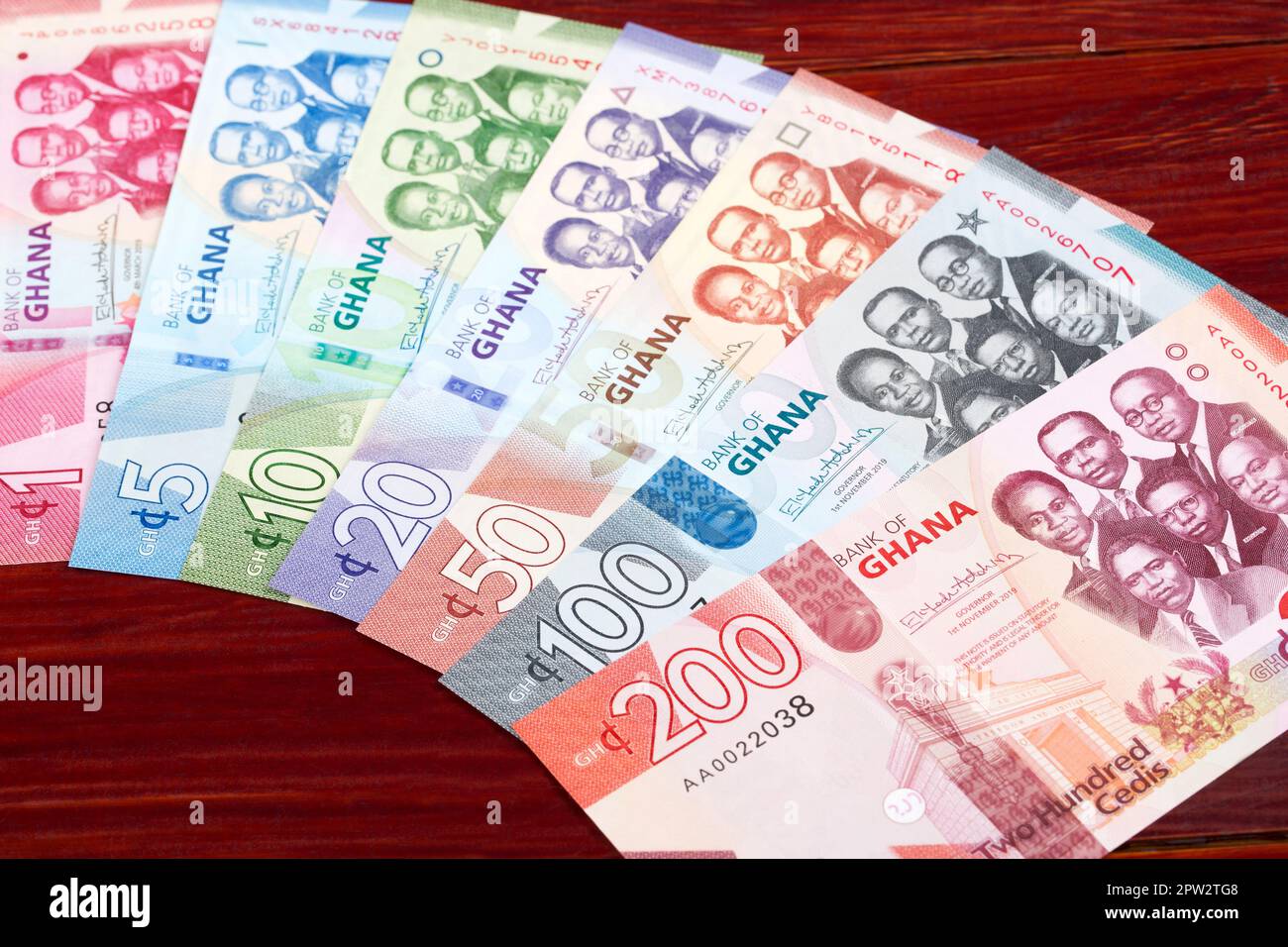 Ghanaian money - cedi a business background Stock Photo - Alamy