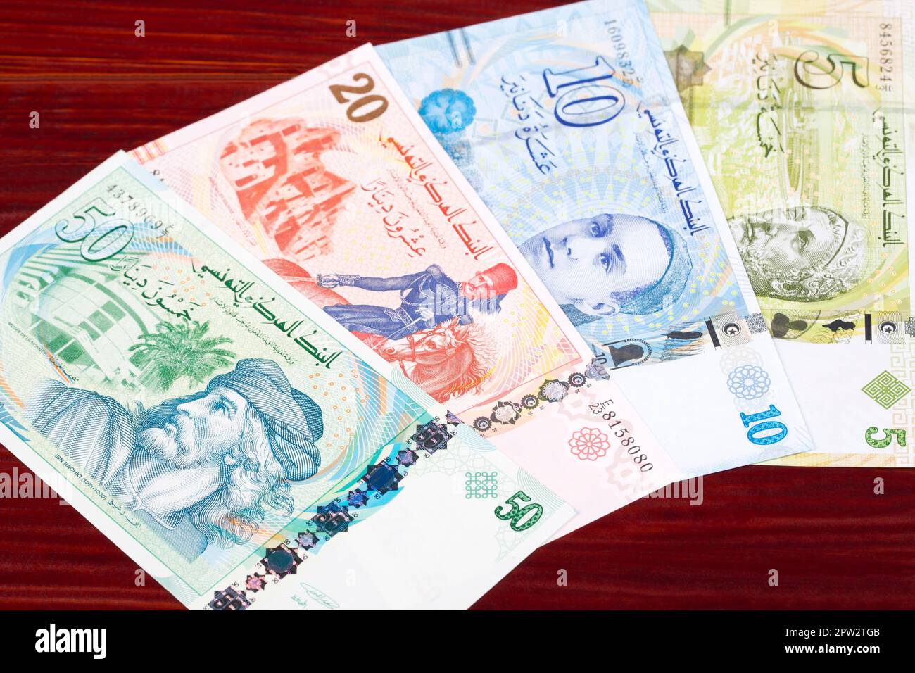 Tunisian money - dinar a business background Stock Photo - Alamy