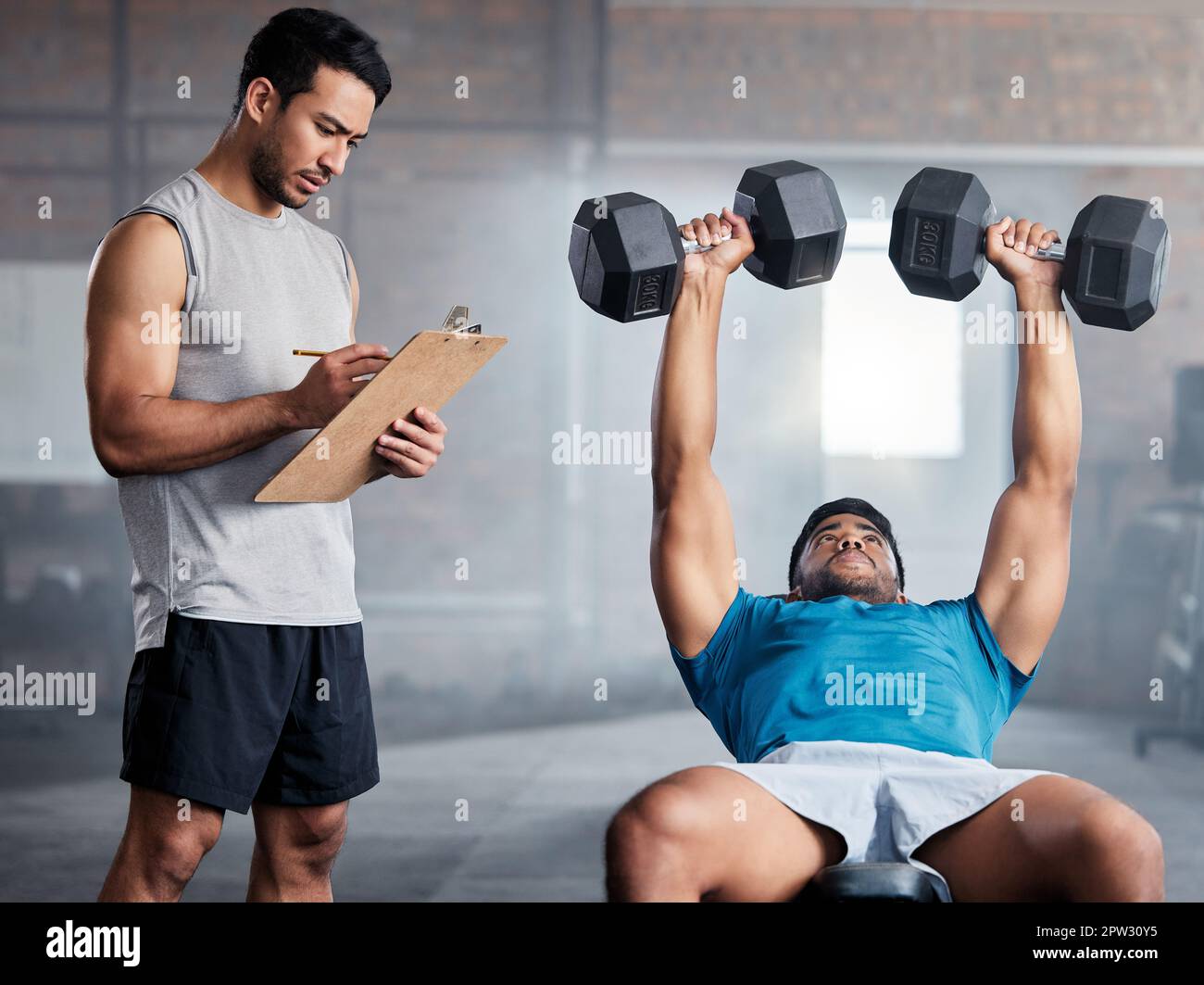 Fitness, body builder and weight, coach or personal trainer with ...