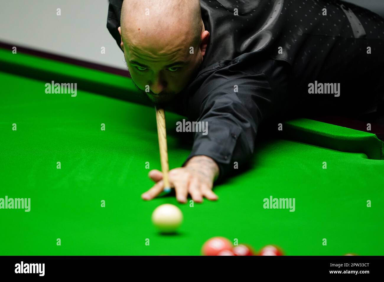 Luca Brecel in action against Luca Brecel (not pictured) on day ...