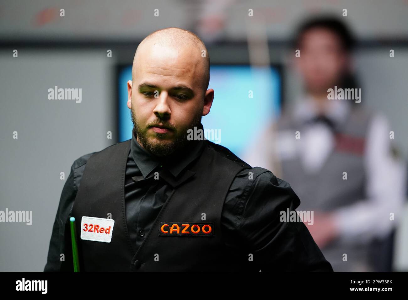 Luca Brecel in action against Si Jiahui (not pictured) on day fourteen of the Cazoo World ...