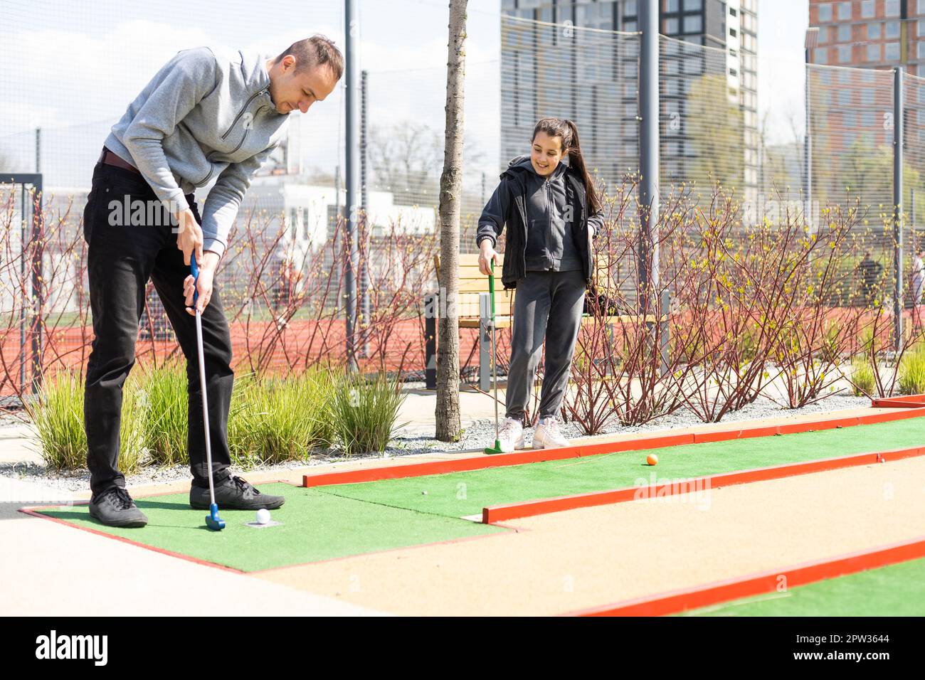 Mini-golf ball on artificial grass. Summer season game Stock Photo - Alamy
