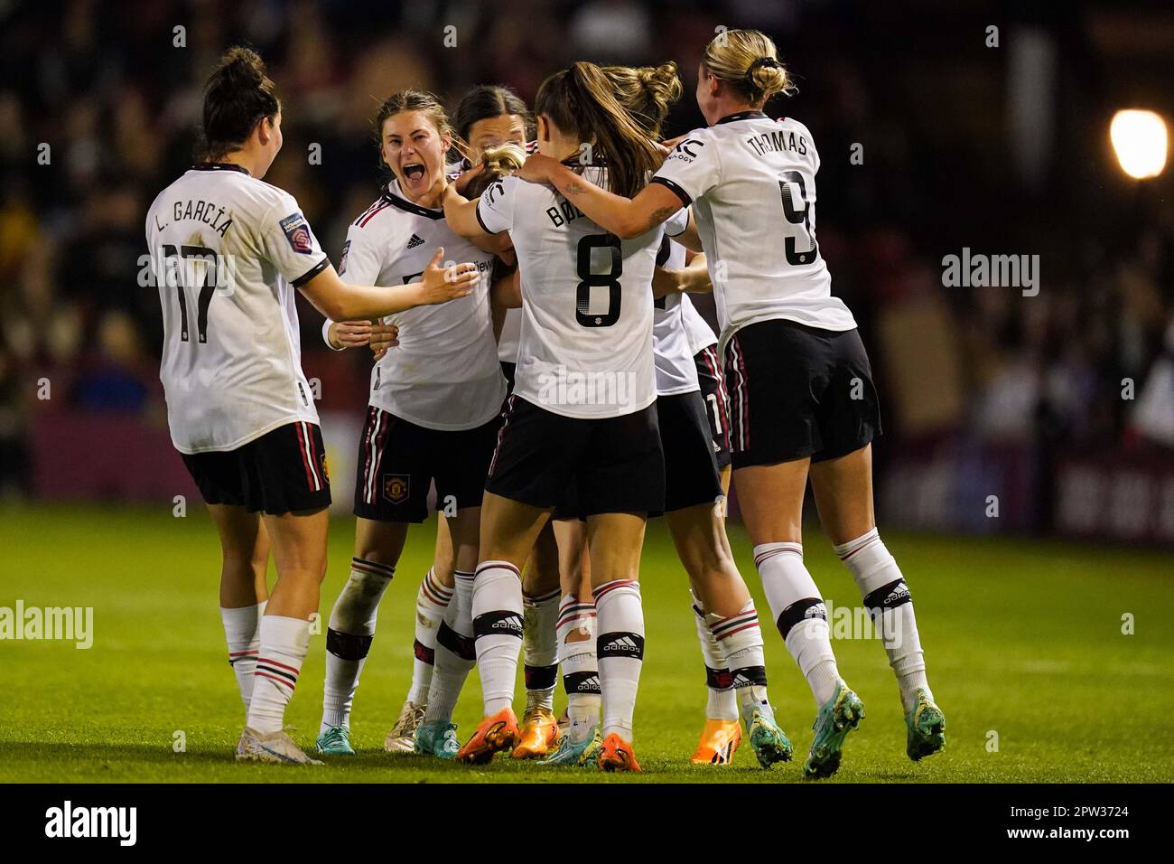 Manchester United players celebrate Millie Turner's match winning goal ...