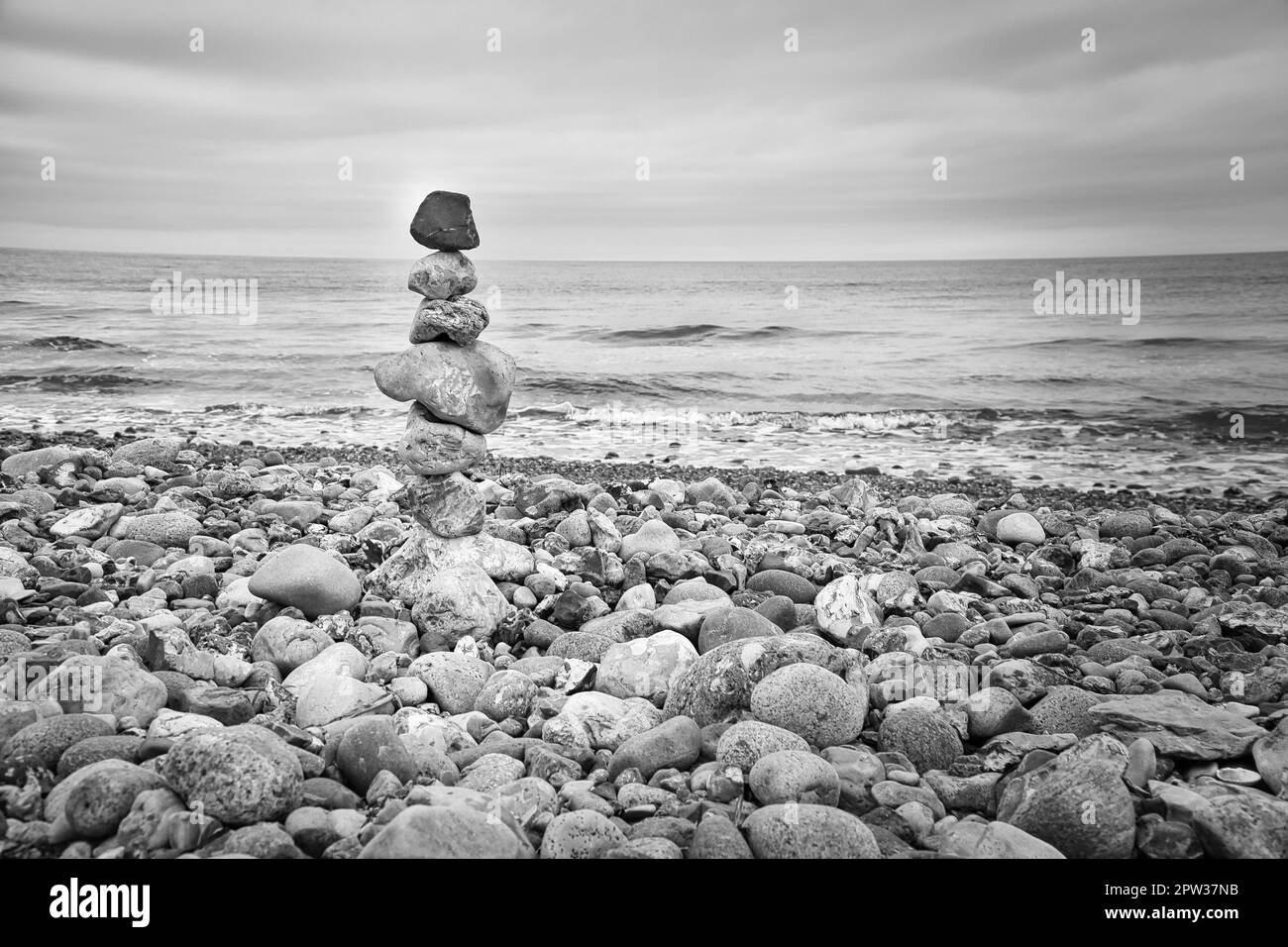 Stone pyramid on the beach overlooking the sea. Danish coast ...