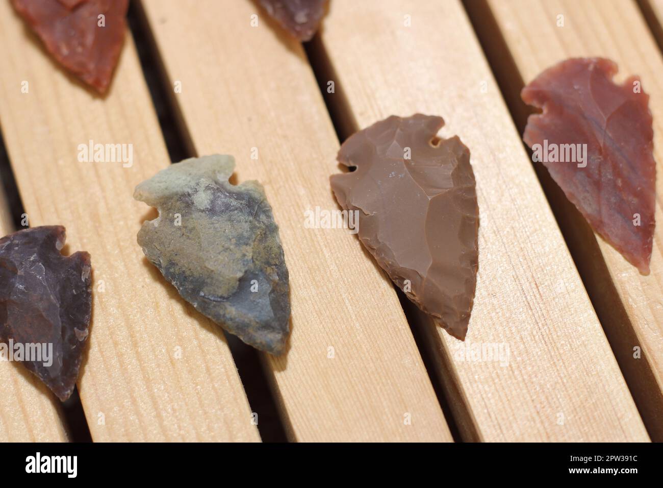 Native American Arrowhead Collection on Wooden Dispalay Stock Photo - Alamy