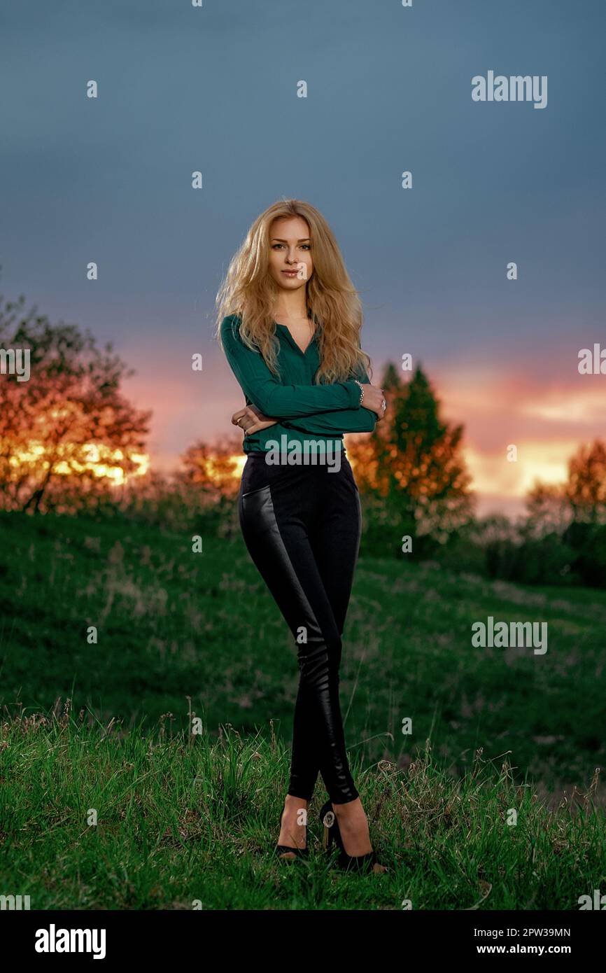 Outdoor country portrait of pretty blonde woman in sunset time Stock ...