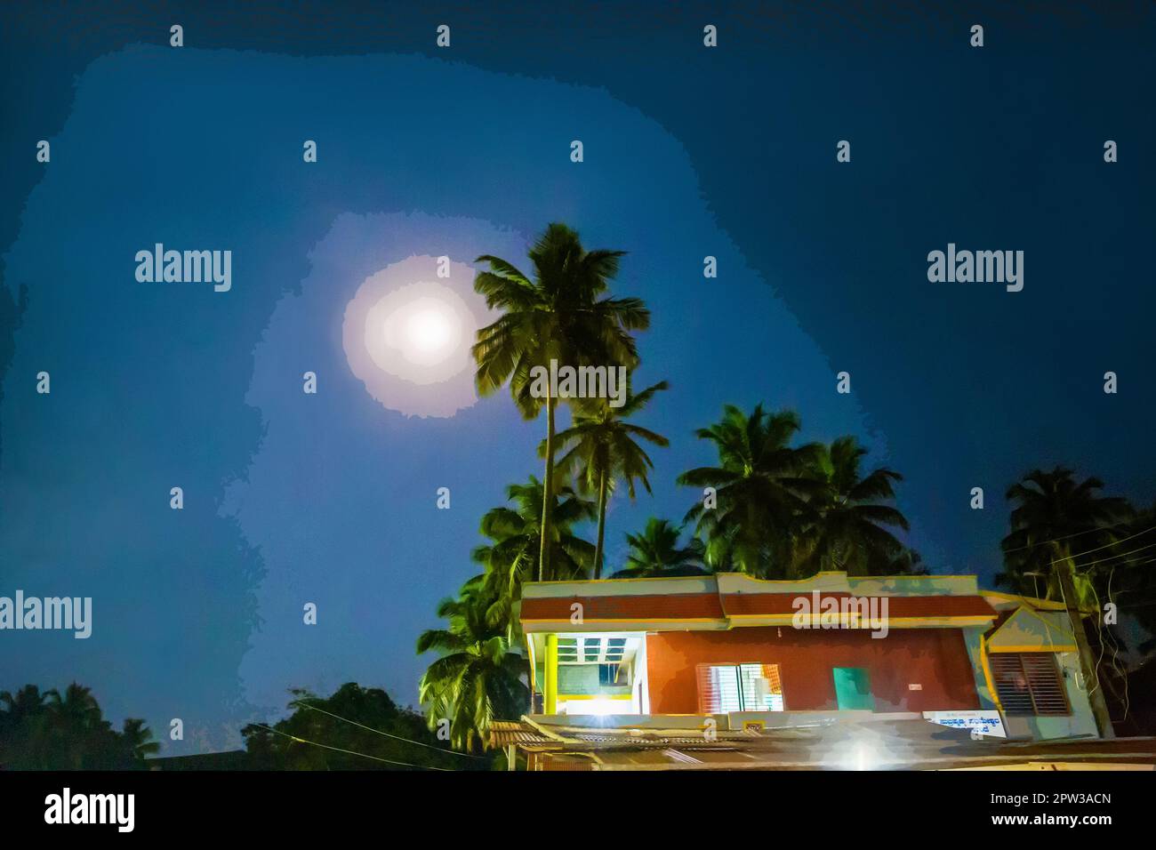 Night sky view with moon and palm and some building in Goa as symbol of ...