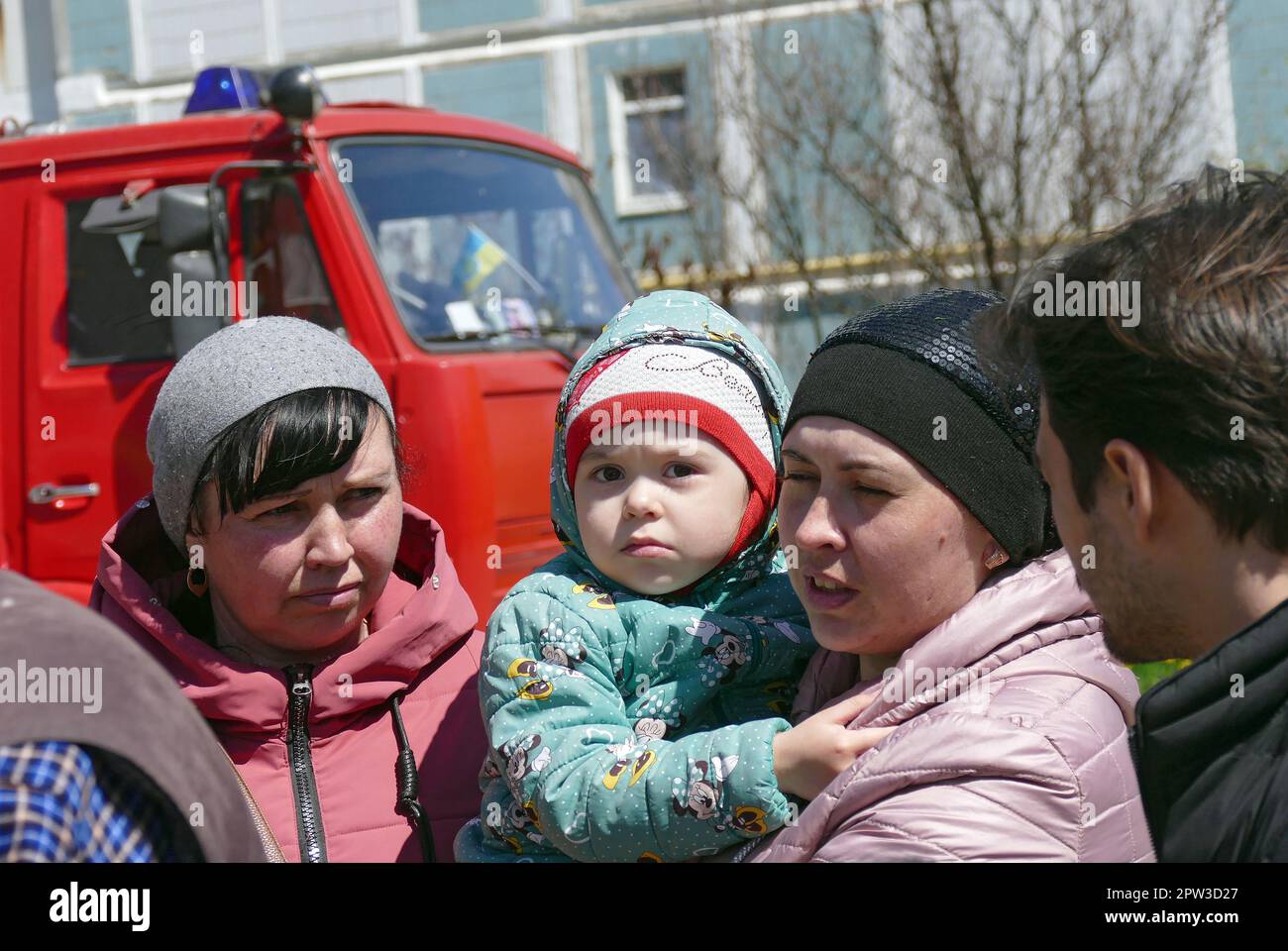 UMAN, UKRAINE - APRIL 28, 2023 - Two women and a child affected by the ...