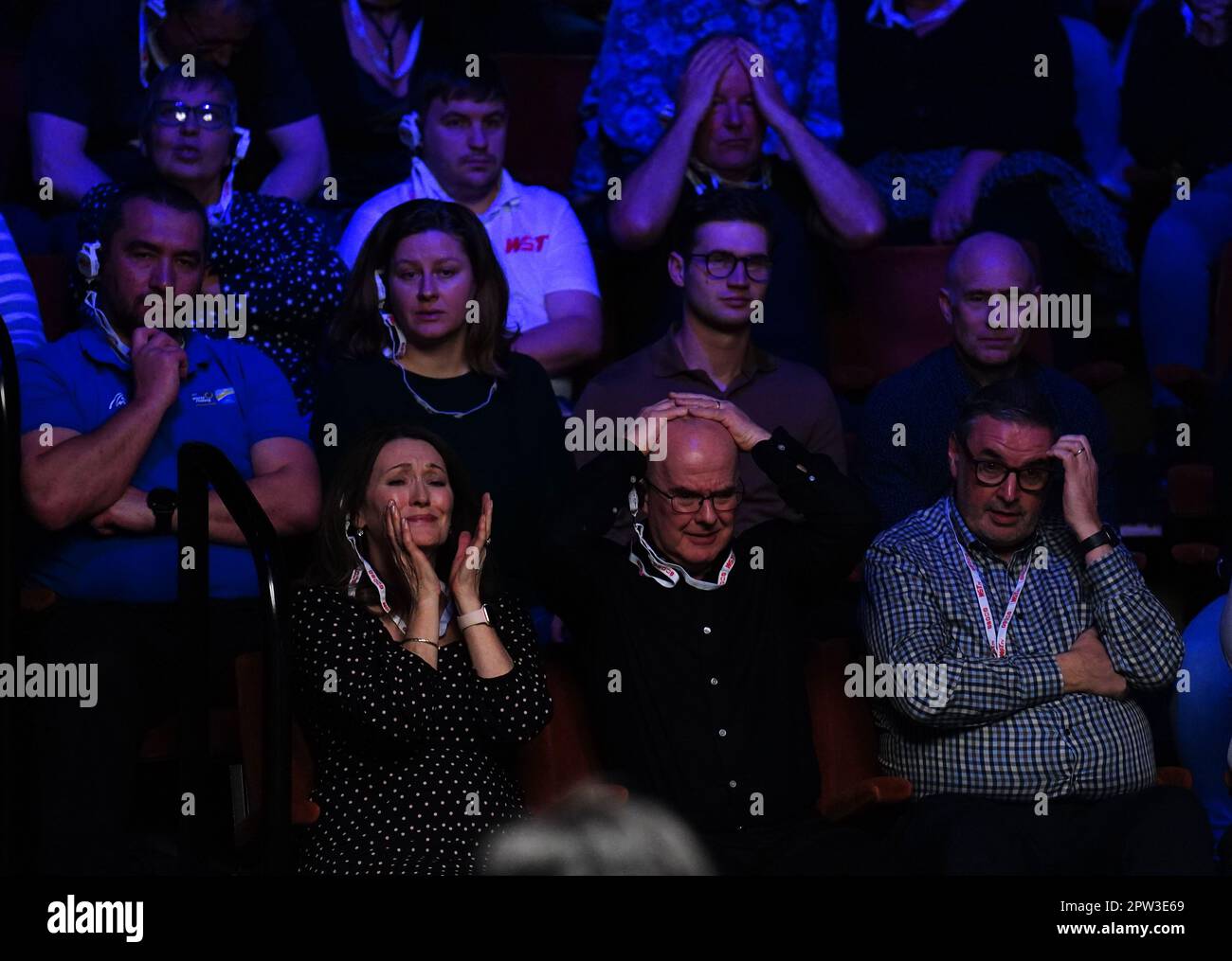Spectators react during the match between Si Jiahui (not pictured) and ...