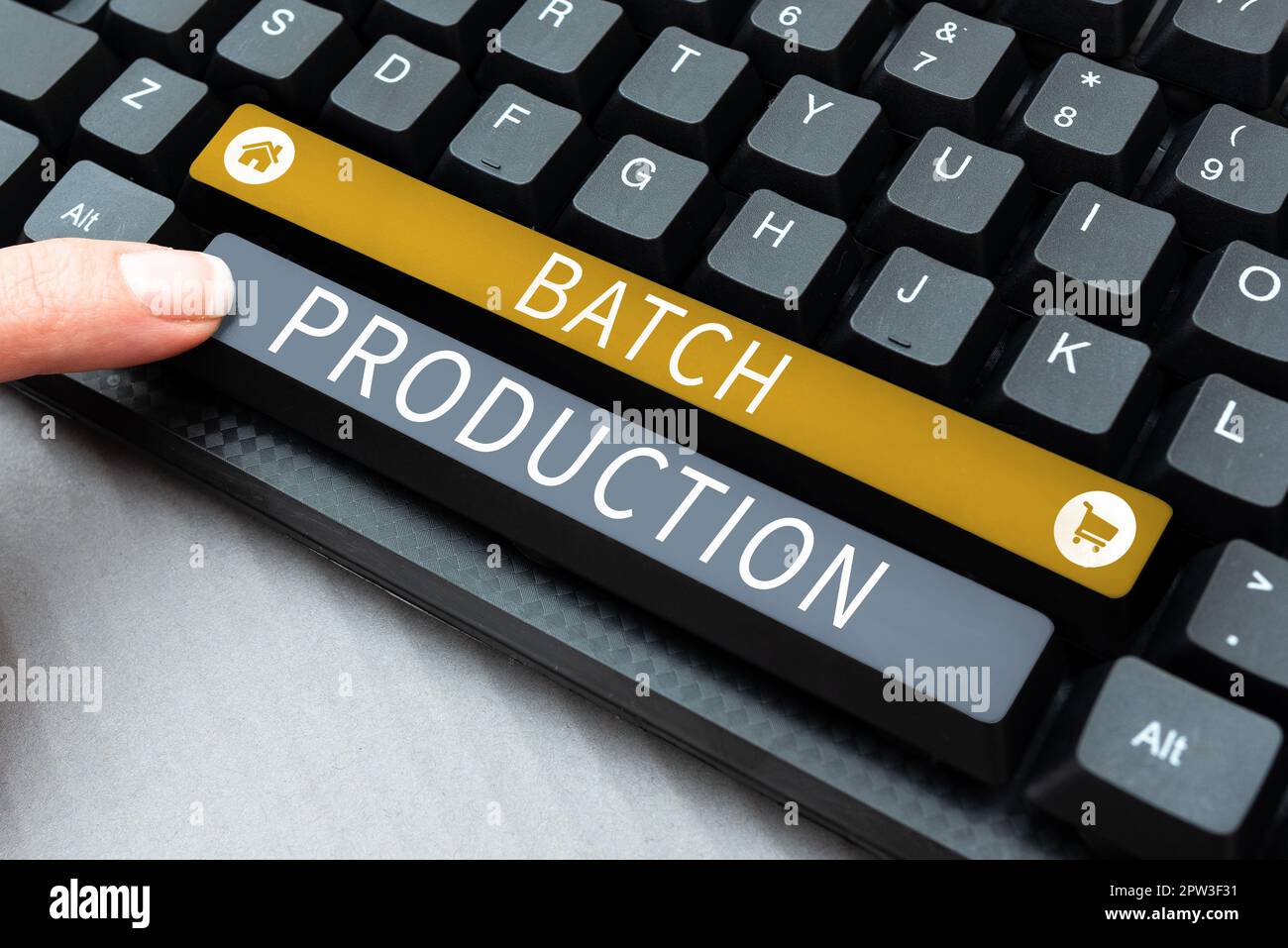 Sign displaying Batch Production, Word for products are manufactured in ...
